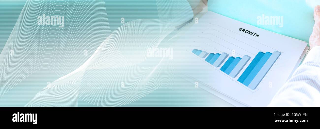 Businessman analyzing a graph showing growth; panoramic banner Stock ...