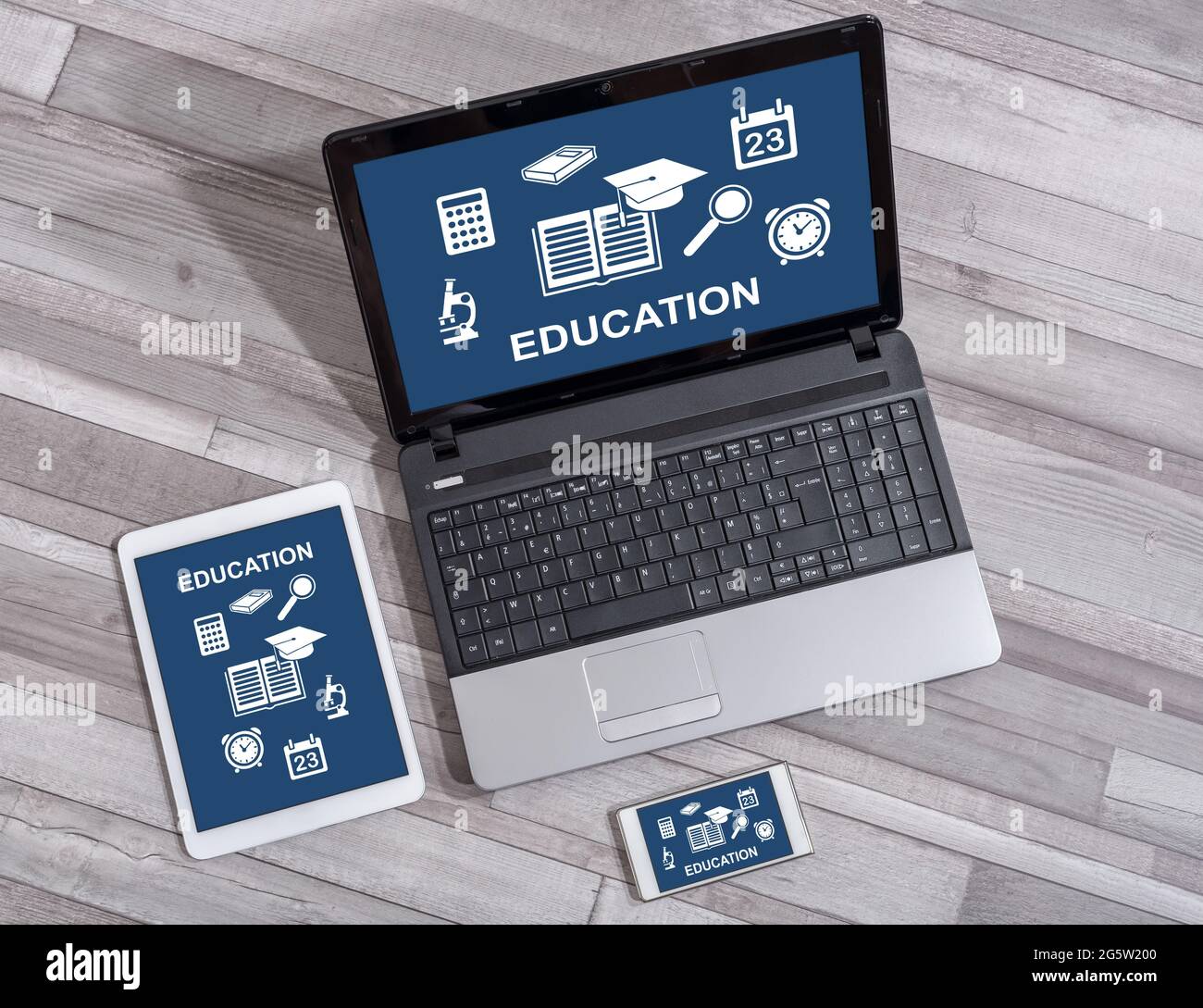 Education concept shown on different information technology devices ...