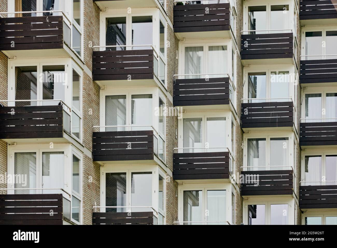 Facade of a high-rise building with vacation apartment for tourists ...