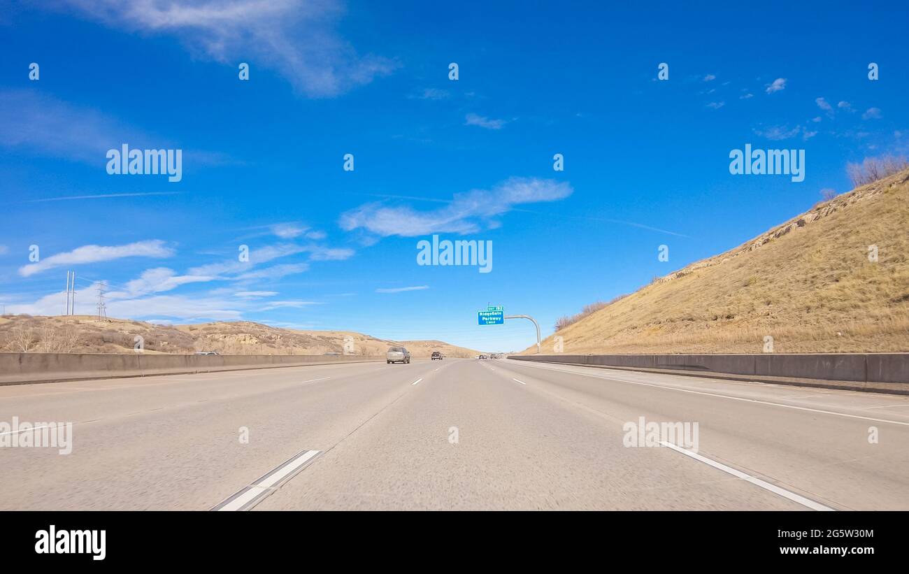 Driving on an interstate highway in suburban America Stock Photo - Alamy