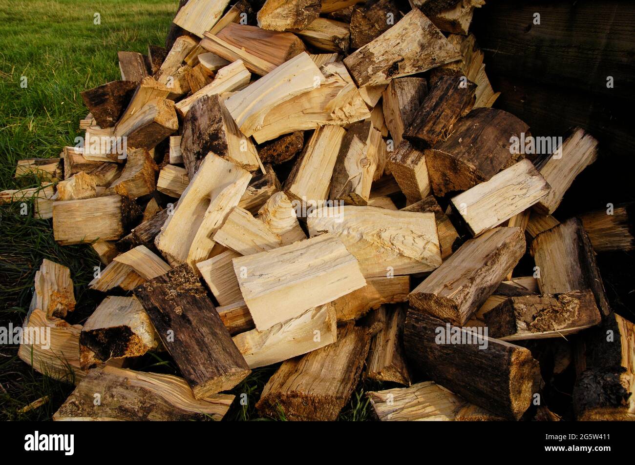 large stack of split firewood Stock Photo - Alamy