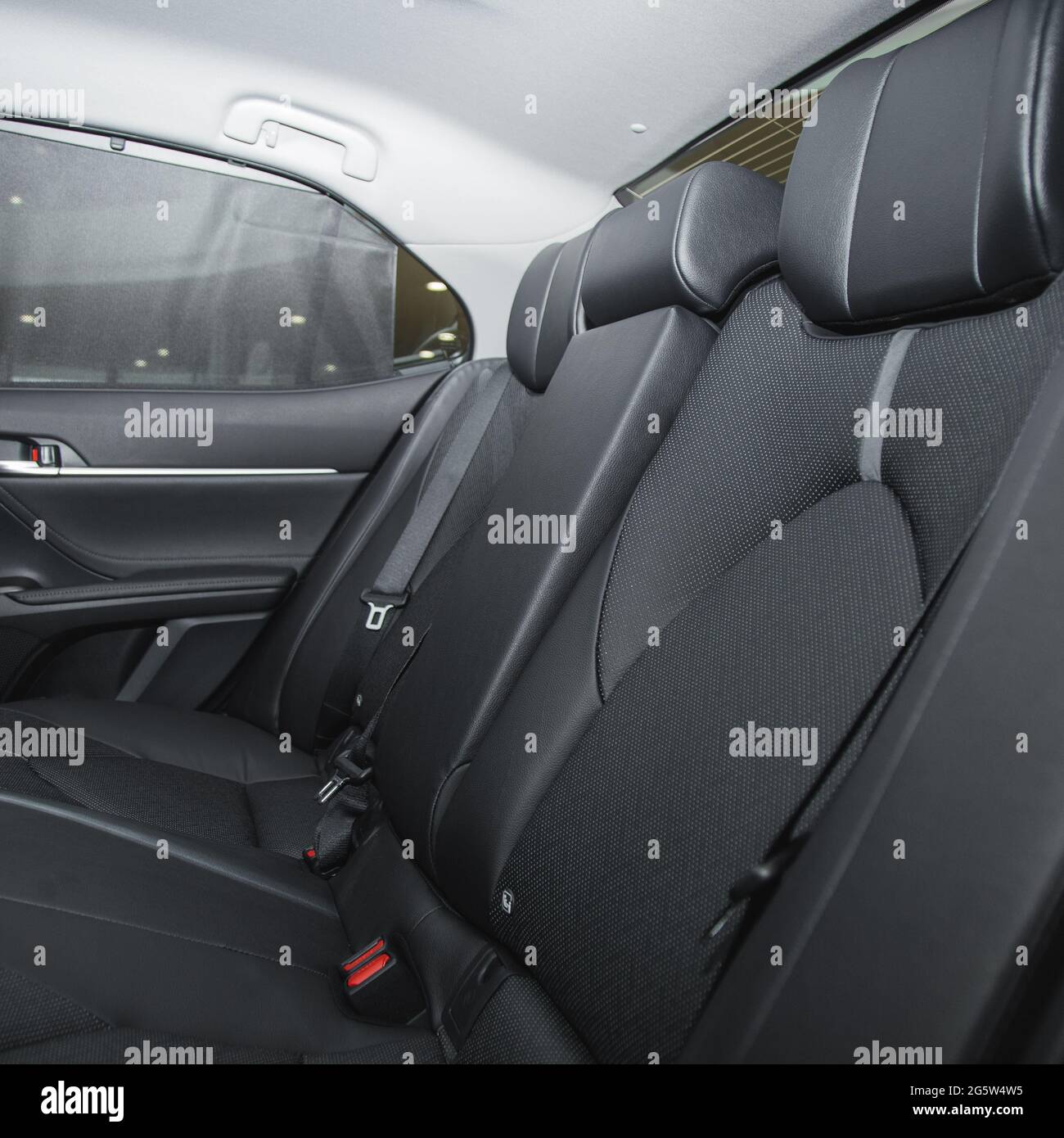 Back passenger seats in modern luxury car Stock Photo - Alamy