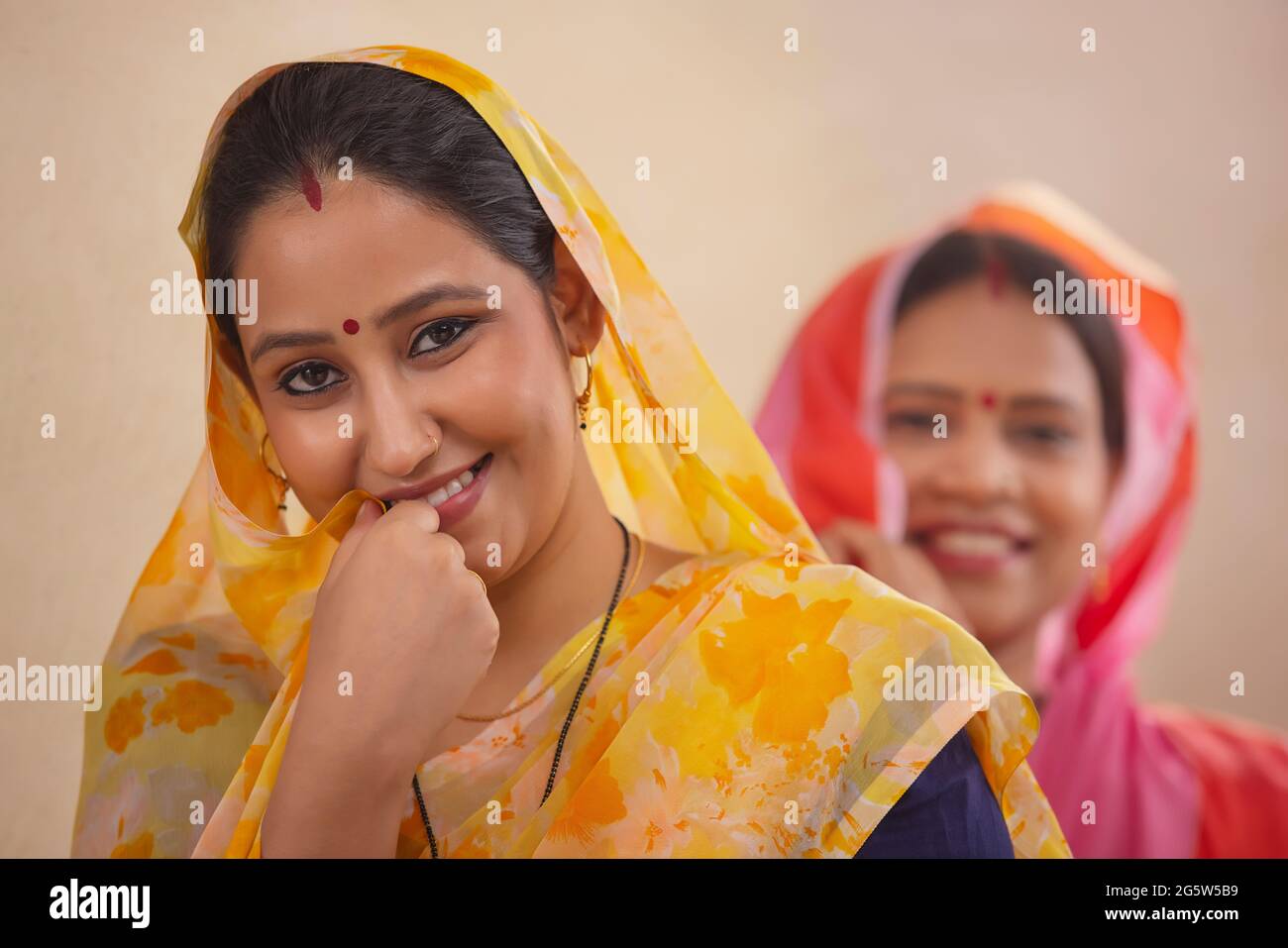 Two rural women smiling Stock Photo - Alamy