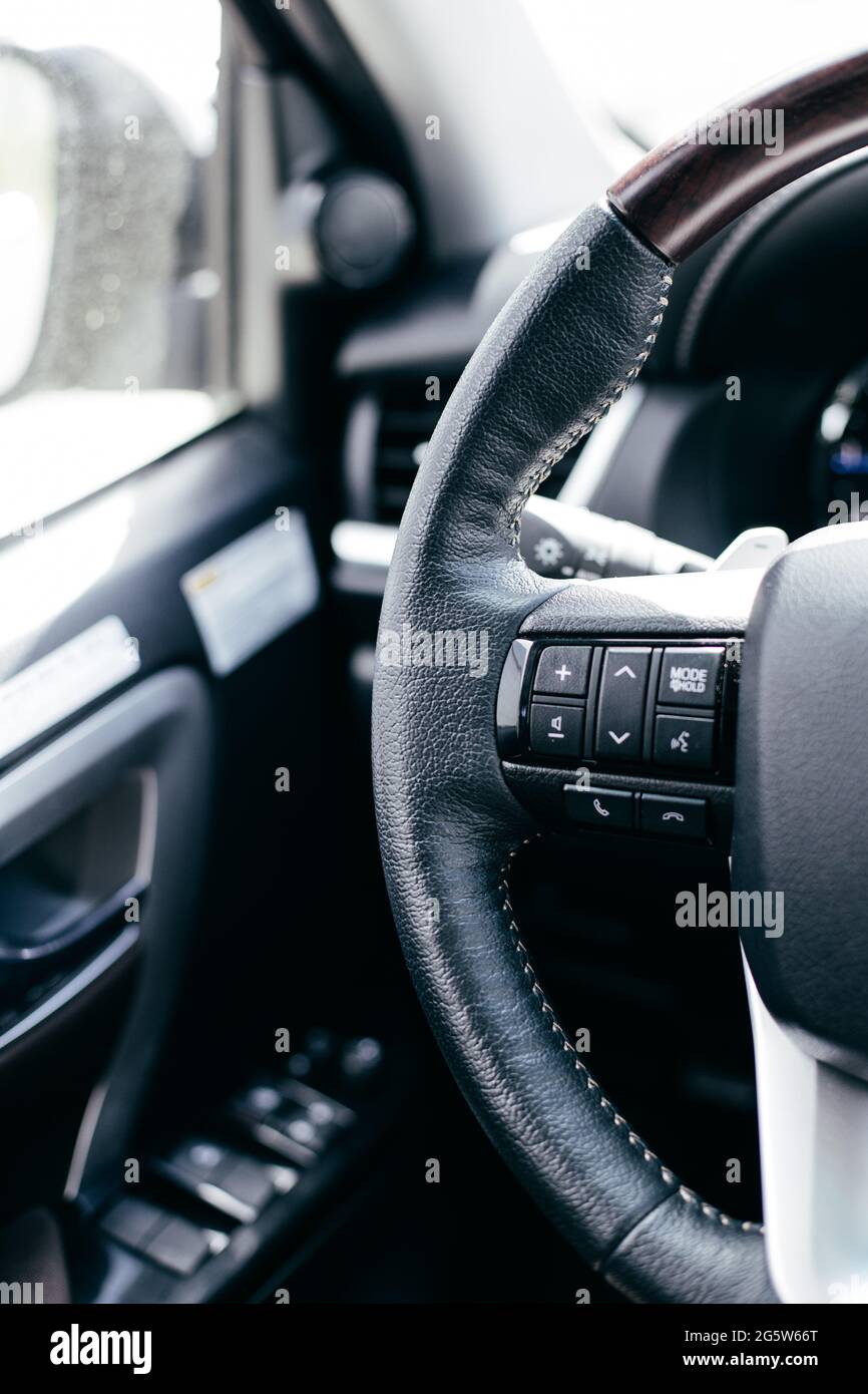 Close up of steering wheel. Car dashboard Stock Photo - Alamy