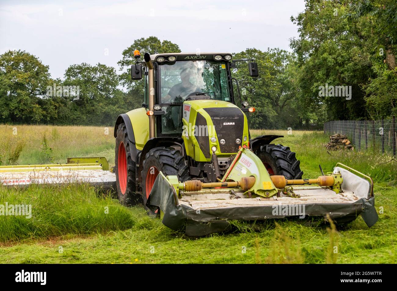 Summer grass cutting, Forest of Dean. CLAAS 820 Axion tractor and ...