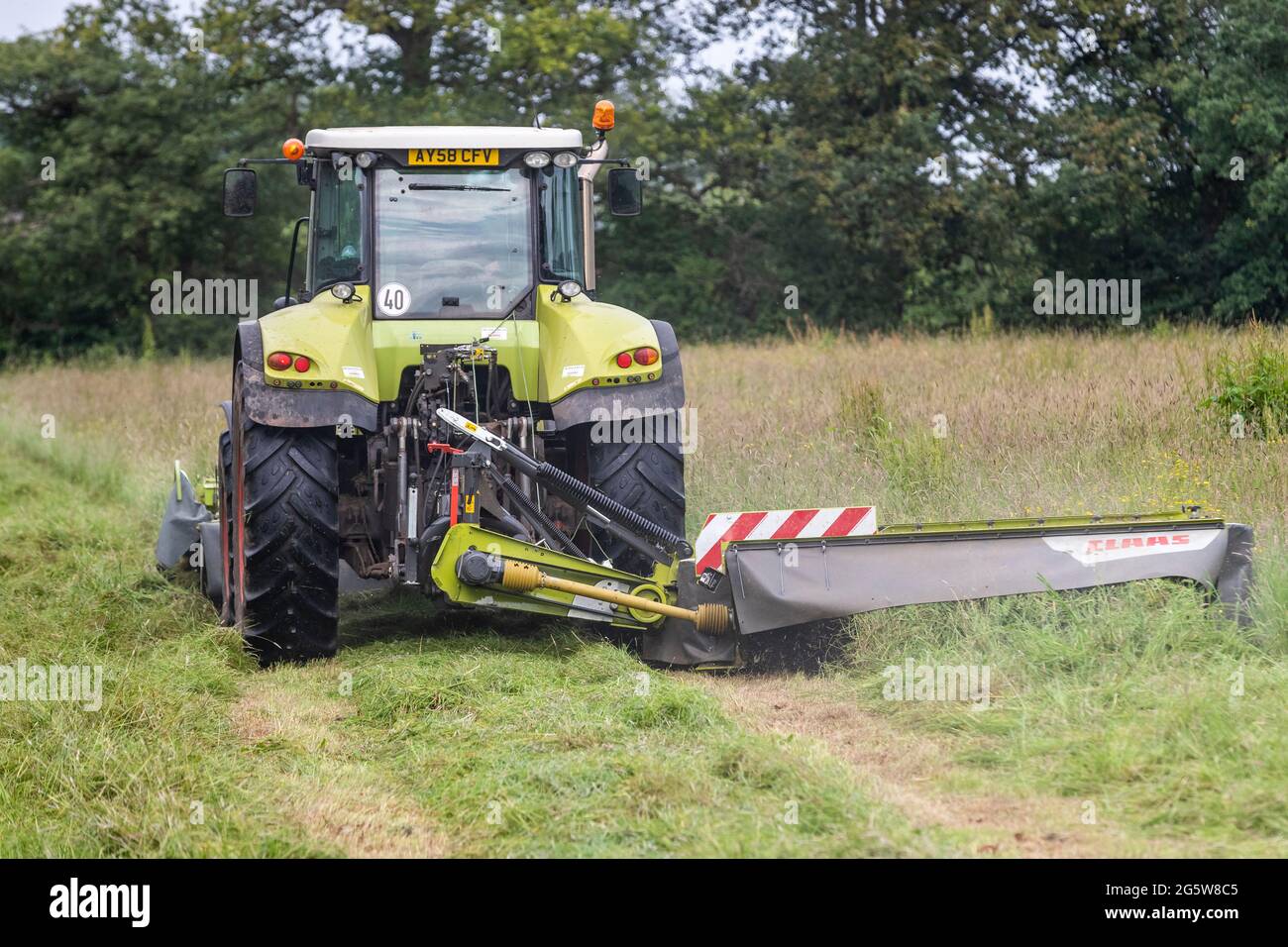 Summer grass cutting, Forest of Dean. CLAAS 820 Axion tractor and ...