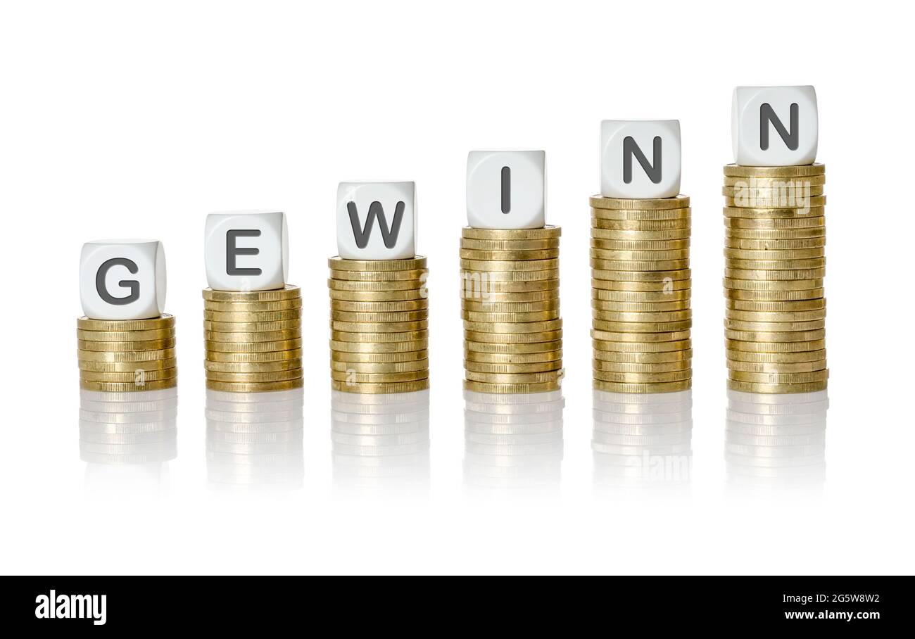 Coin stacks with letter dice - Profit - Gewinn German Stock Photo - Alamy