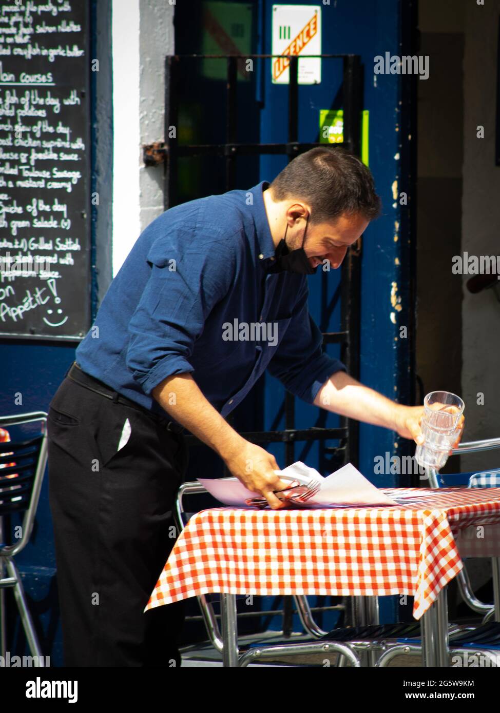 Person Clearing The Table