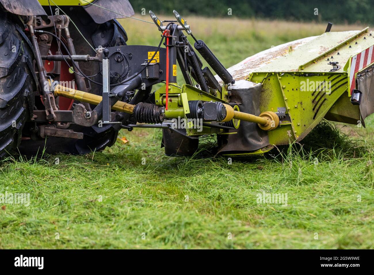 Summer grass cutting, Forest of Dean. CLAAS 820 Axion tractor and ...