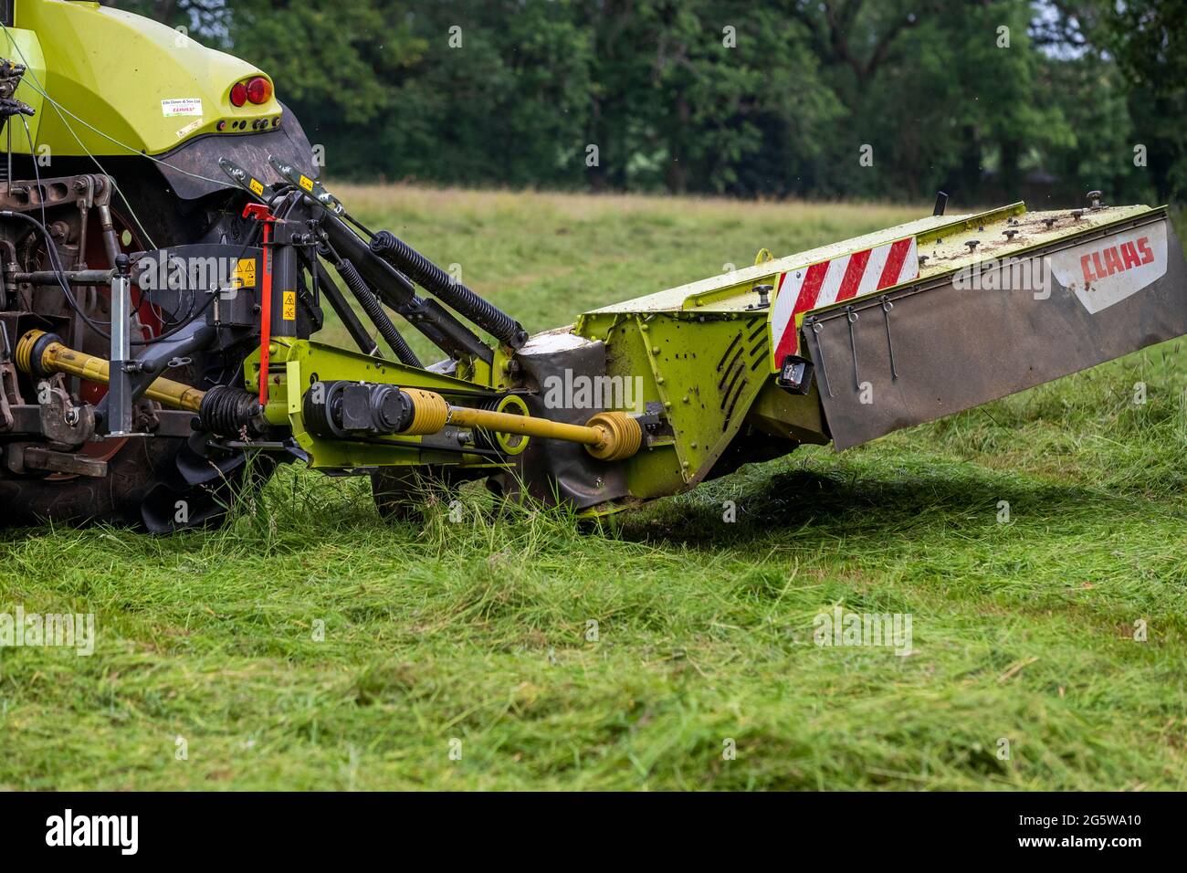 Summer grass cutting, Forest of Dean. CLAAS 820 Axion tractor and ...