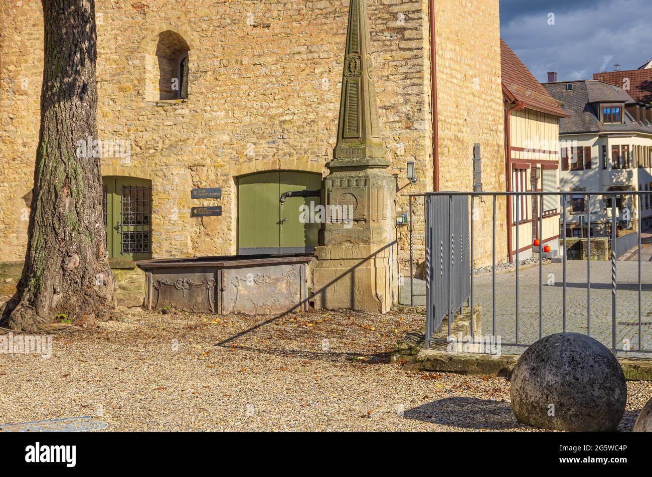 Fountain with obelisk in the courtyard in front of the town hall, the ...