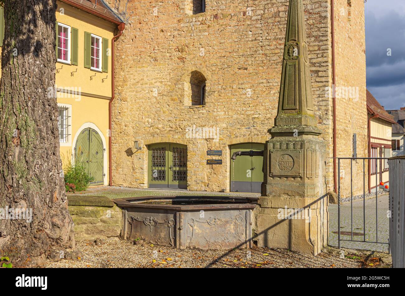 Fountain with obelisk in the courtyard in front of the town hall, the ...