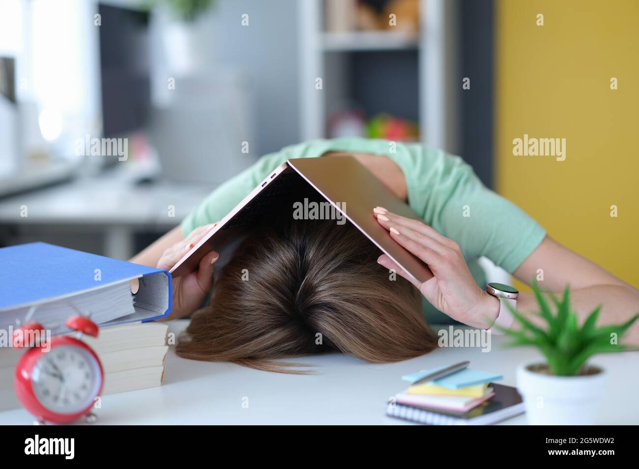 Depressed girl head on table hi-res stock photography and images - Alamy