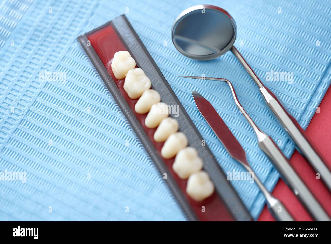Dental set and dental instruments lie on table closeup Stock Photo - Alamy