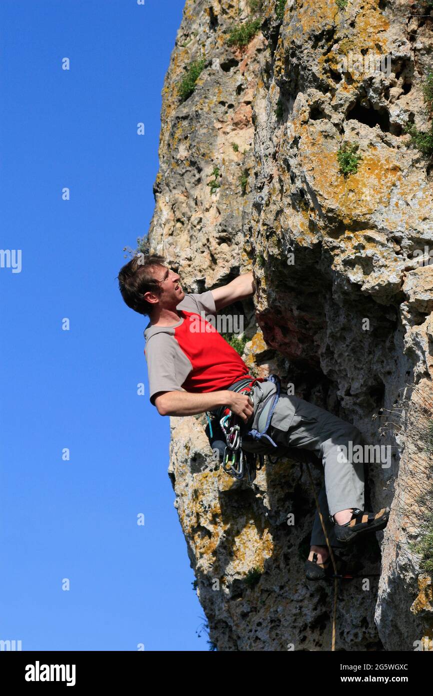 Climbing in the cliff of Caussanel, Herault, Languedoc Roussillon ...