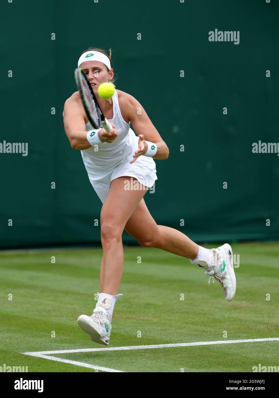 Greet Minnen in action against Ajla Tomljanovic on court 9 on day three ...