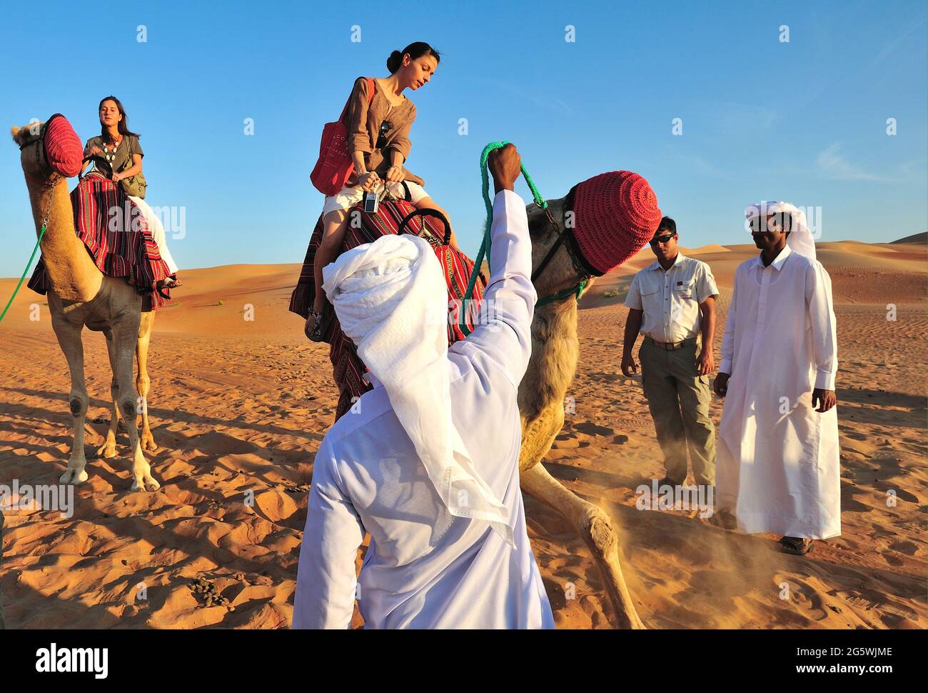 UNITED ARAB EMIRATES. ABU DHABI. CAMEL TRIP IN THE DESERT OF LIWA ...