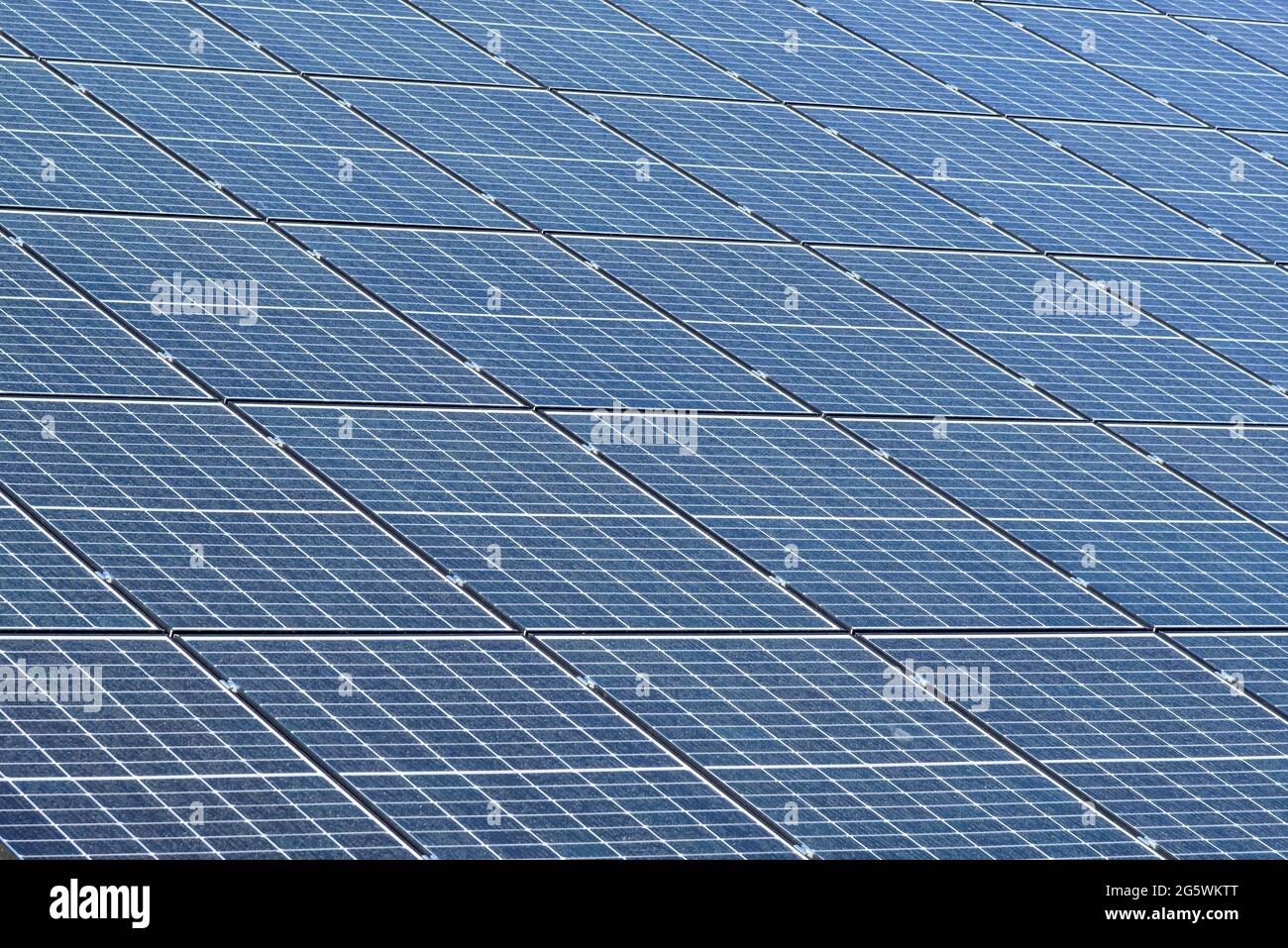 Green energy background made of solar panels Stock Photo - Alamy