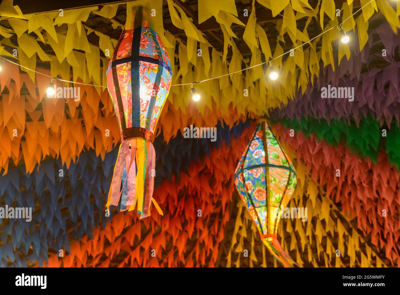Colorful flags and decorative balloon for the Saint John party, which ...