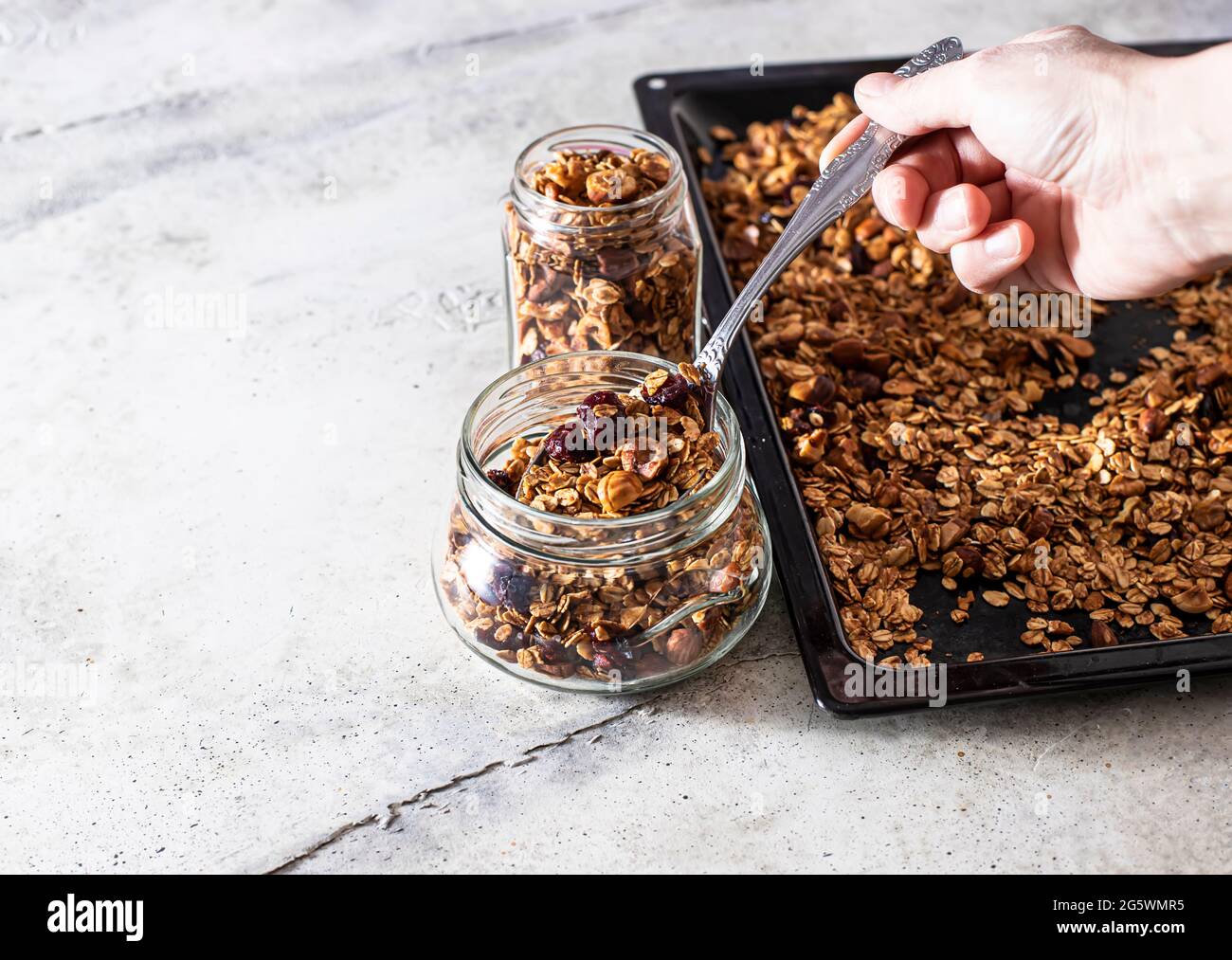 Homemade muesli with oats, nuts and seeds close up. Healthy breakfast ...