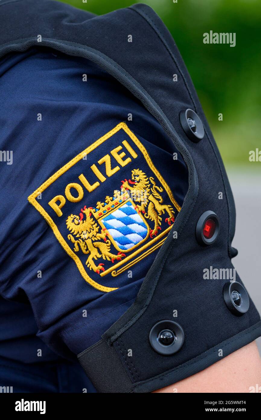 Nuremberg, Germany. 30th June, 2021. A police officer wears the vest of ...