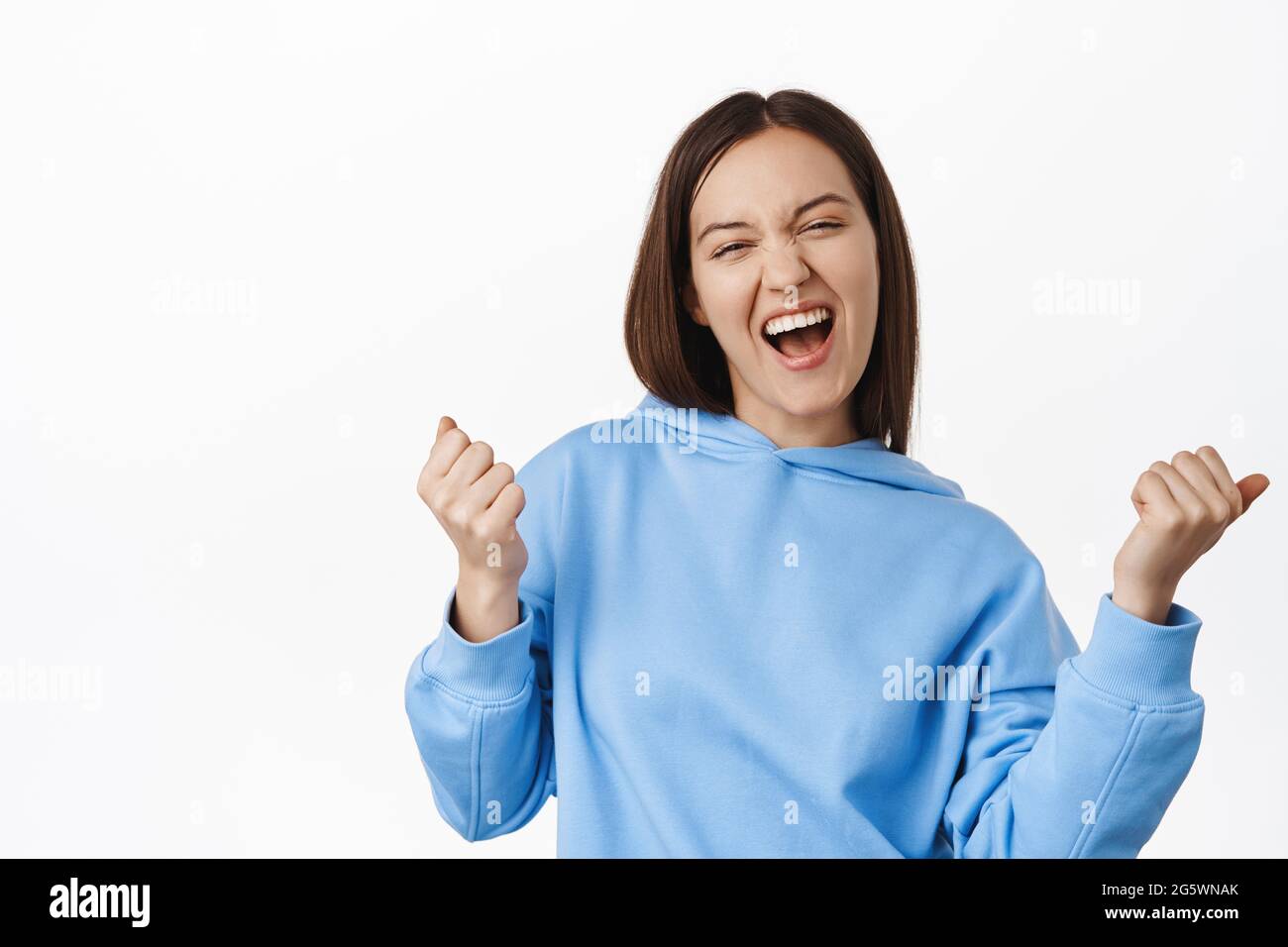 Yeah baby Im winner. Girl celebrating win, achieve success goal ...