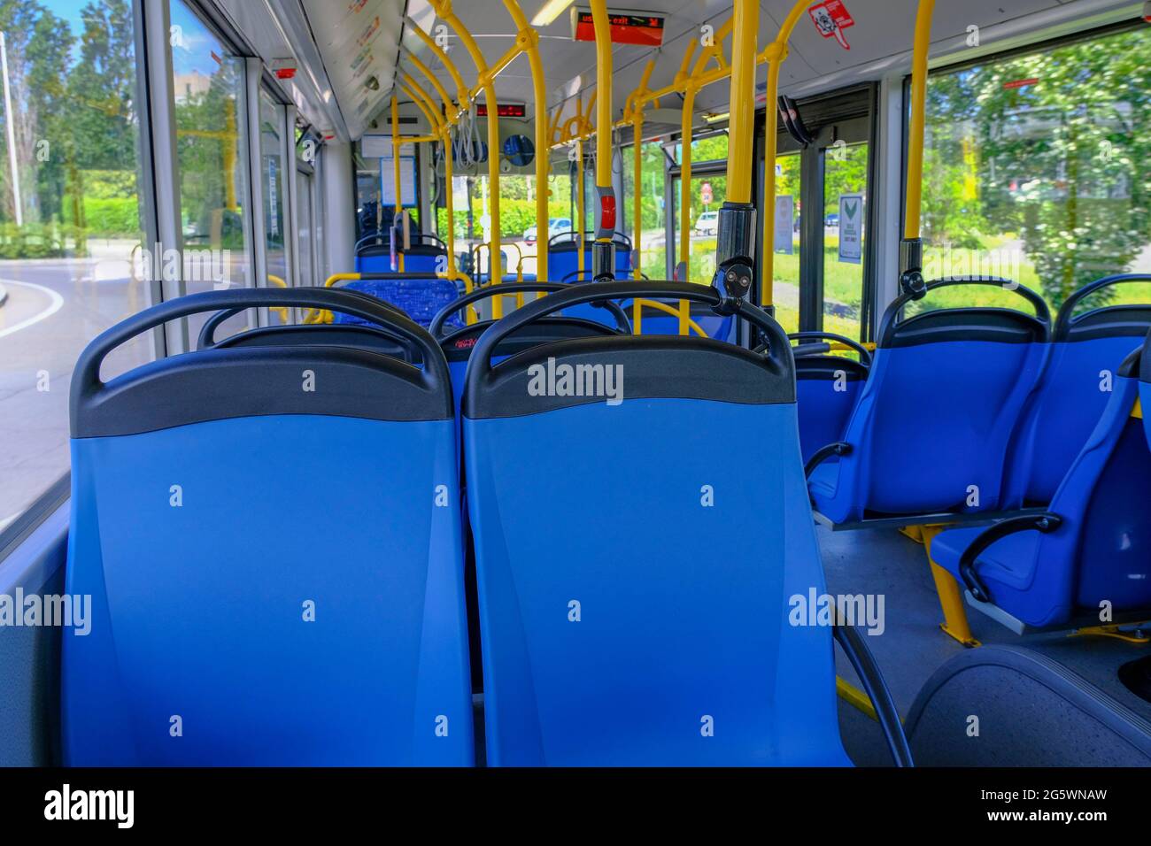 Empty blue seats in a bus close-up. Public urban transportation Stock ...