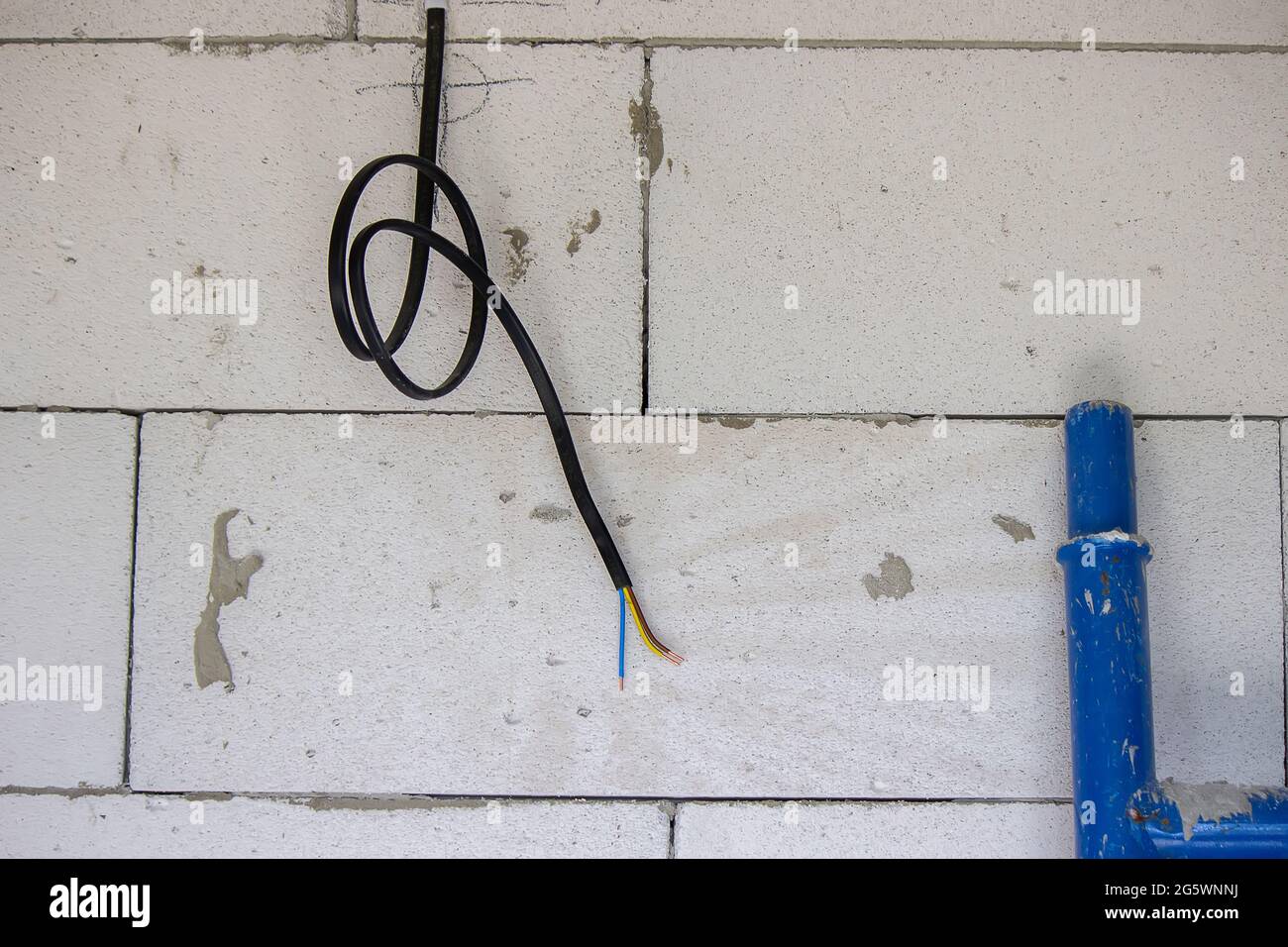 Electrical wiring in the house. Electric cable laying. Selective focus ...