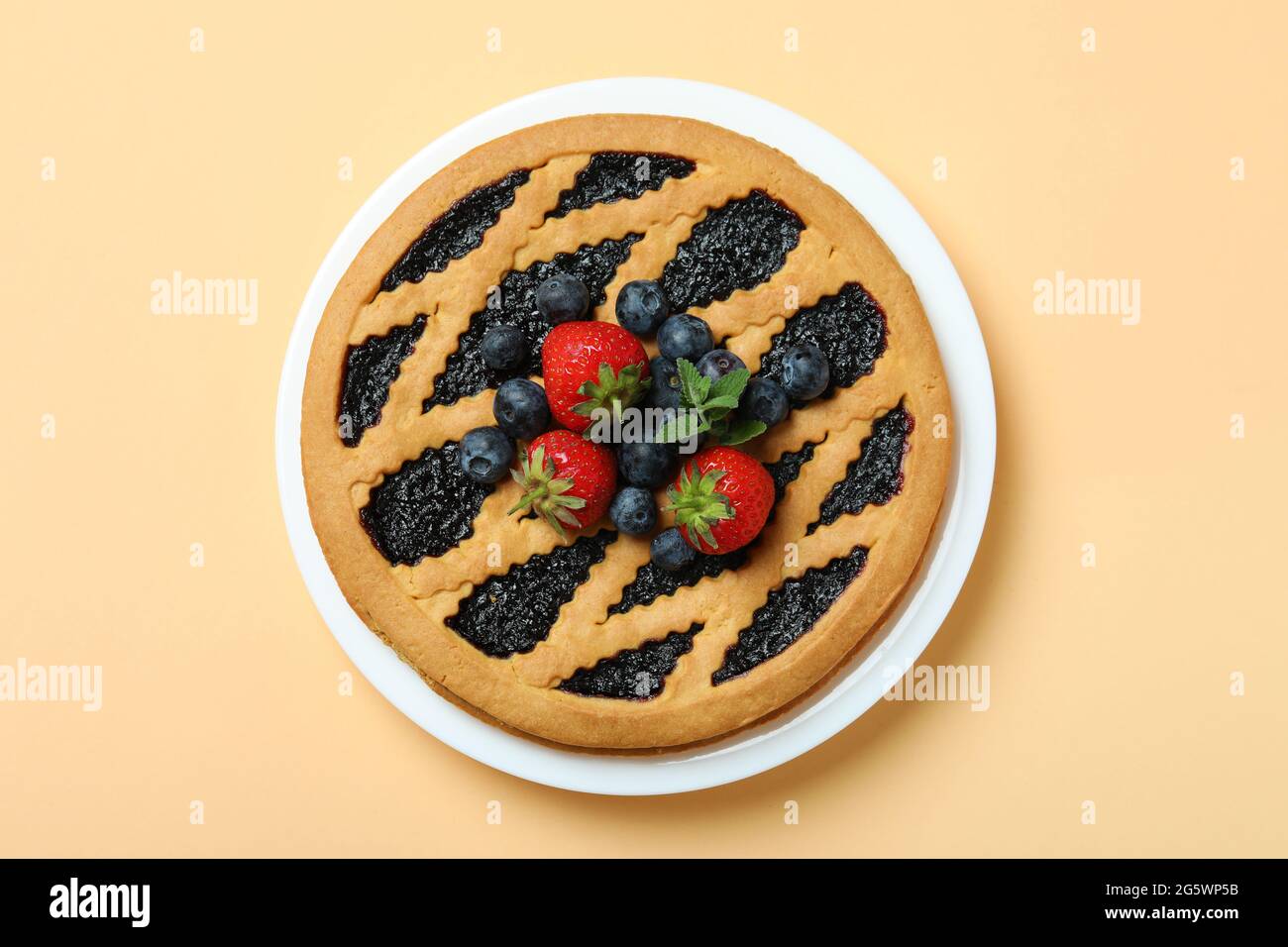 Delicious blueberry pie on beige background, top view Stock Photo - Alamy