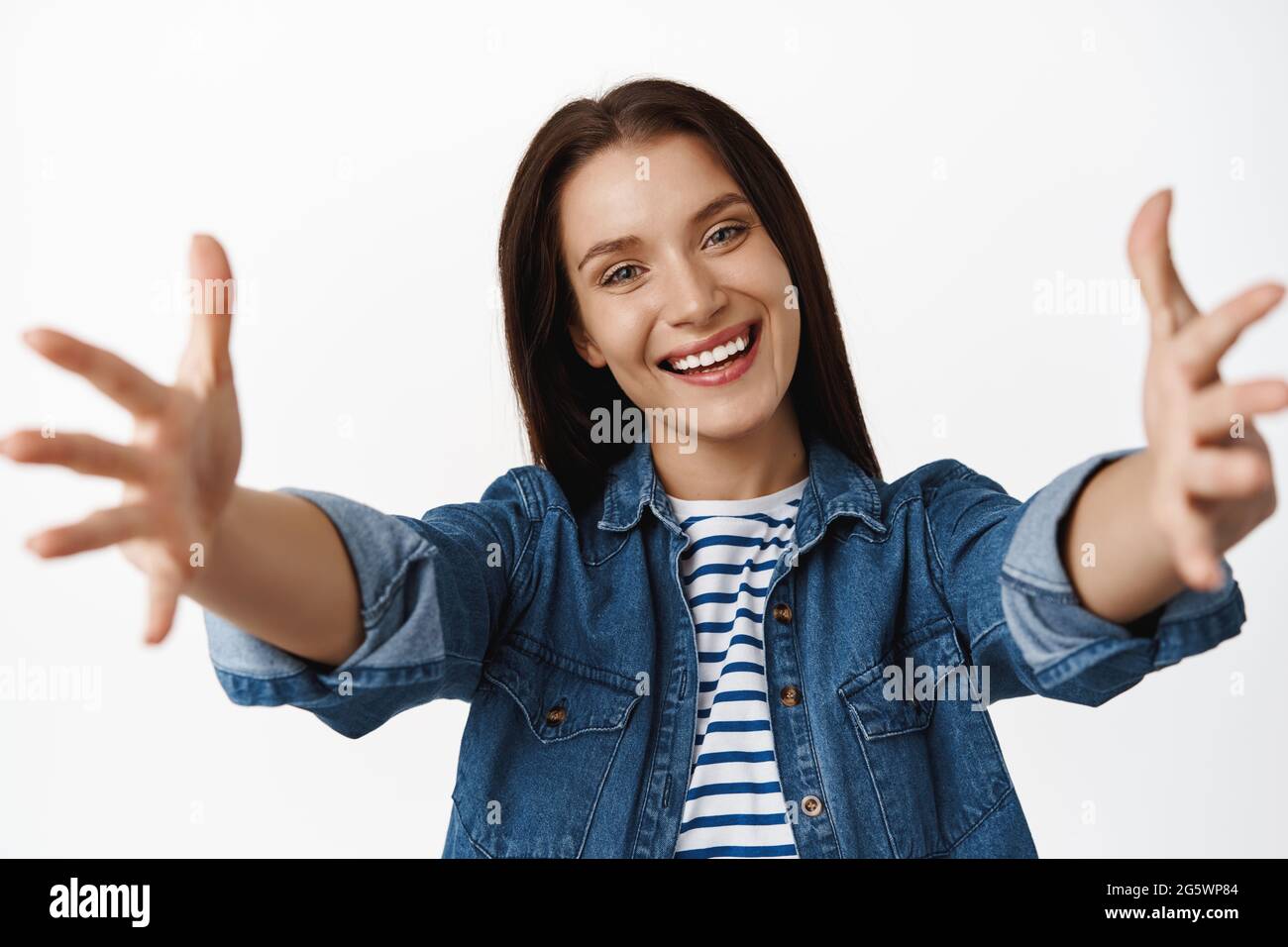 I take it. Smiling happy woman, mother stretch hands out and waiting ...