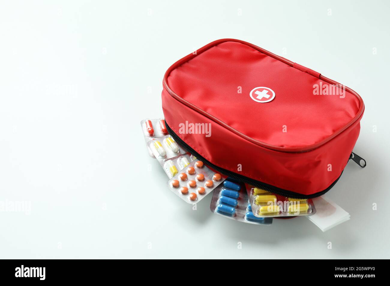 First aid medical kit on white background Stock Photo - Alamy