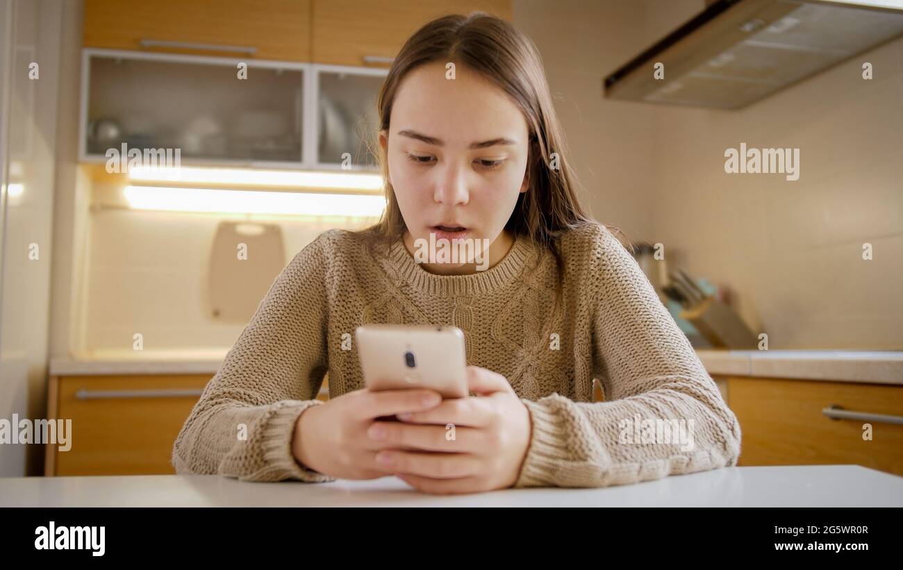 Teenager crying and smartphone hi-res stock photography and images - Alamy