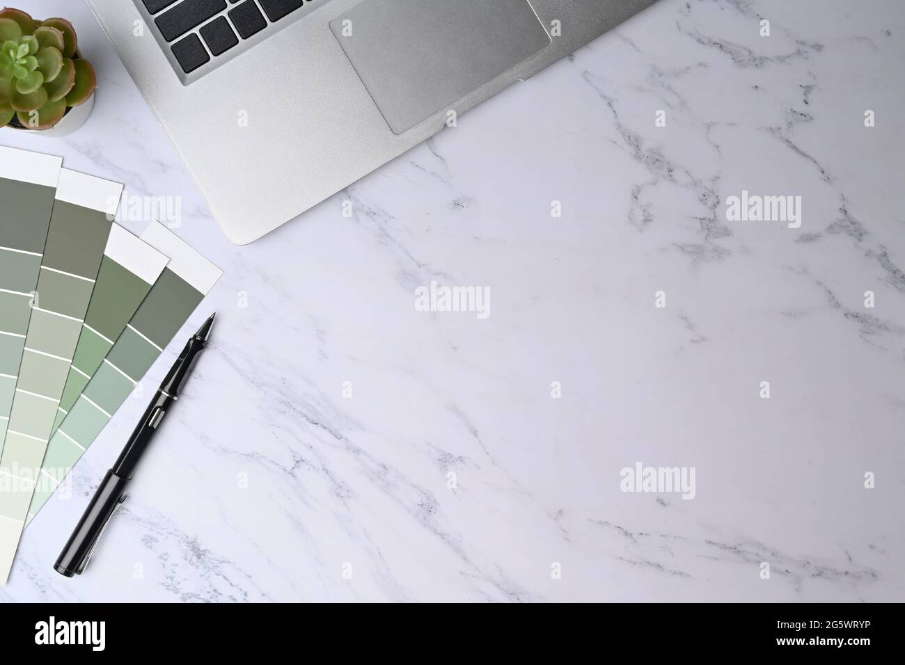 Laptop and color swatch on marble background Stock Photo - Alamy