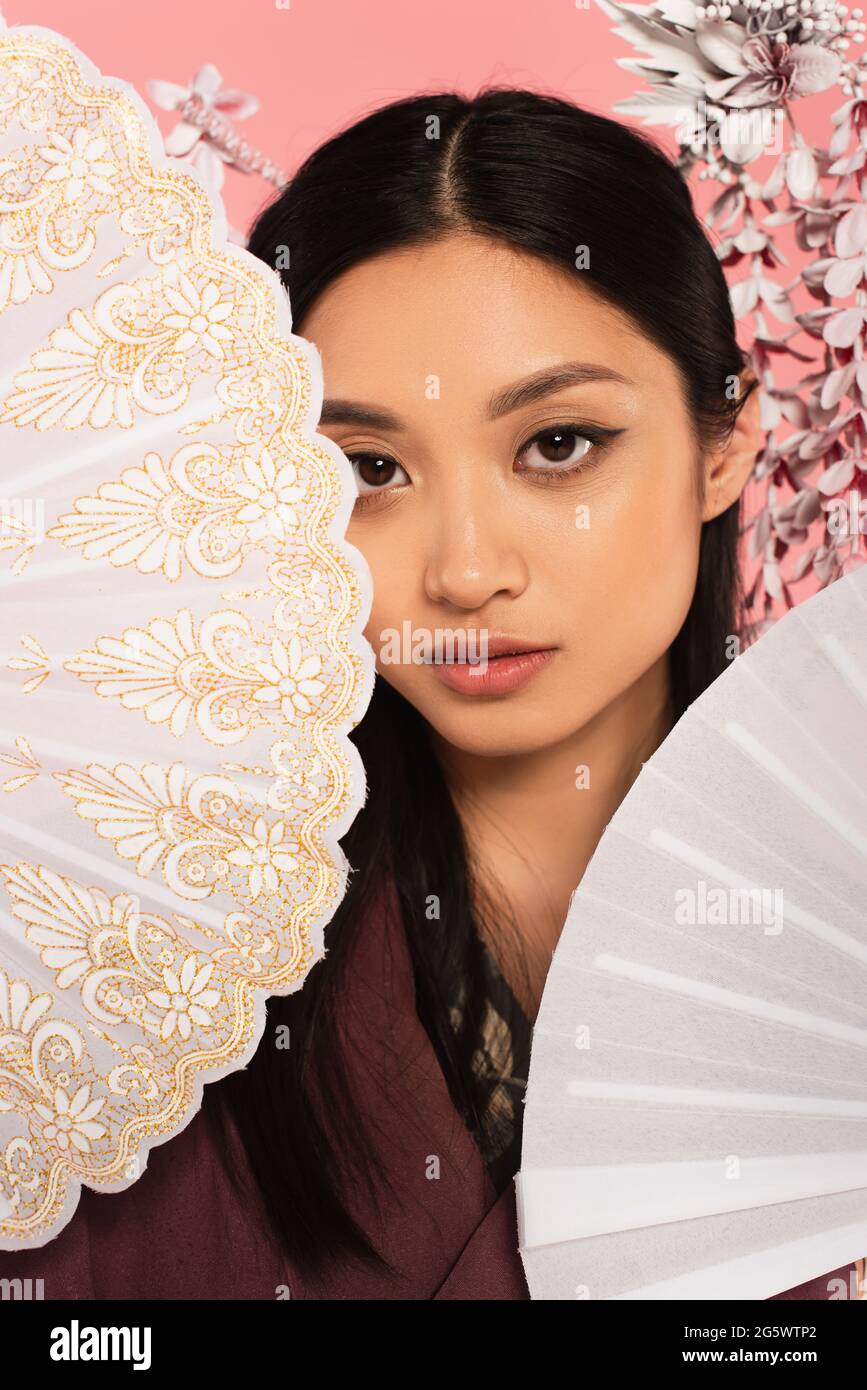 Handheld fans hi-res stock photography and images - Alamy