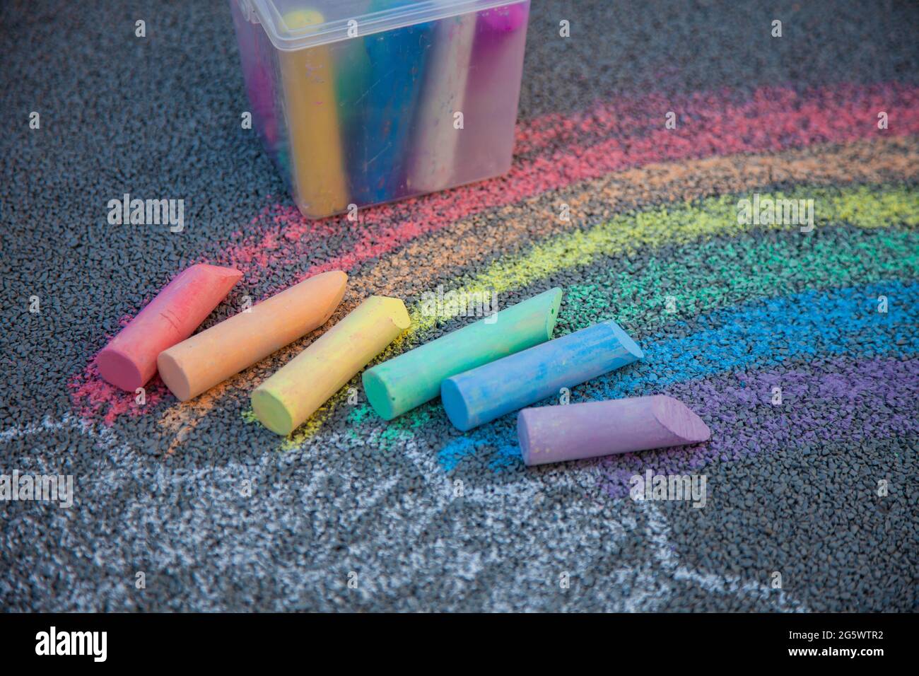 Chalks in rainbow colors. Chalk for drawing on the school board and on ...