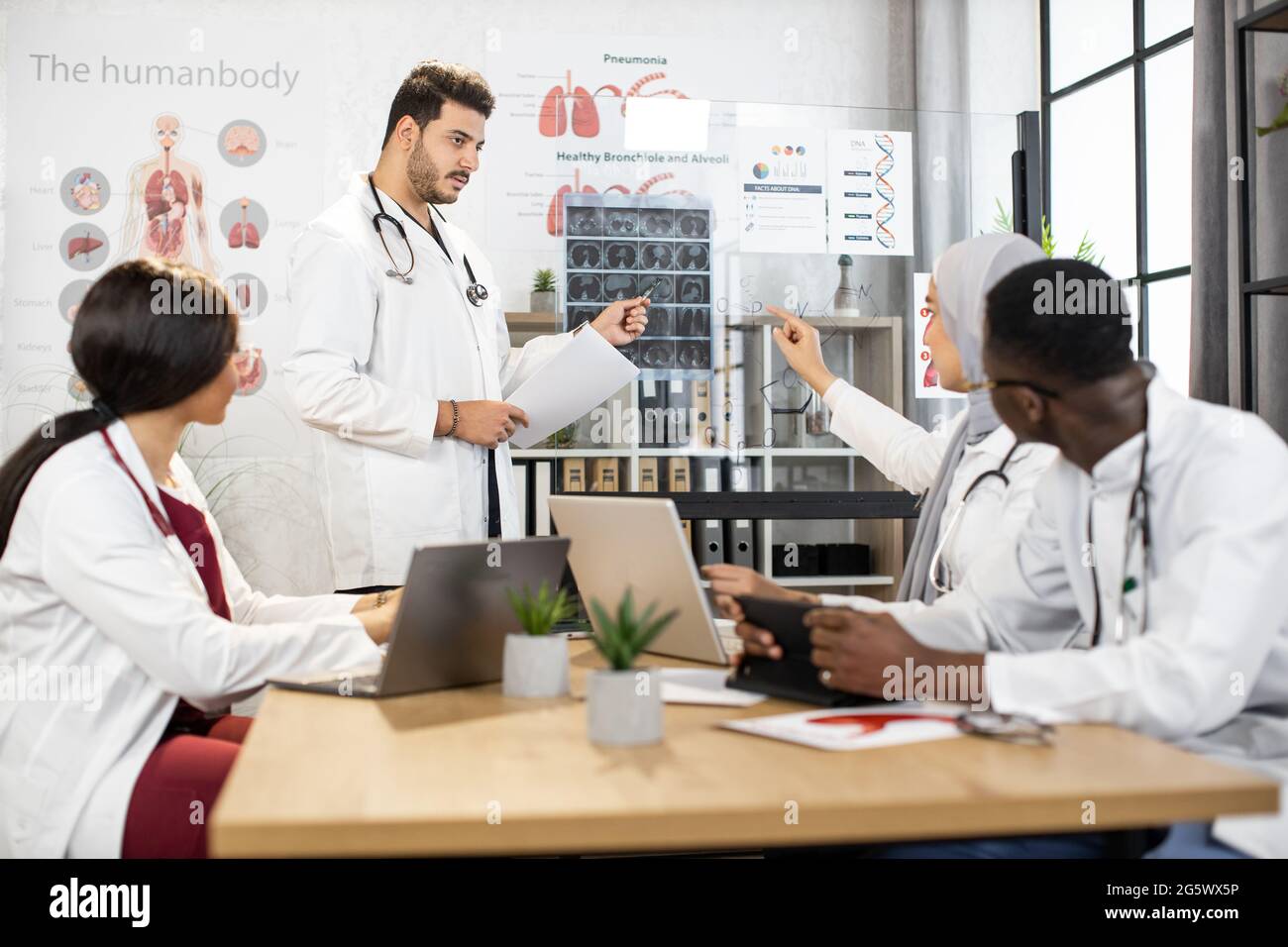 Multiethnic doctors medical diagnostic team hi-res stock photography ...