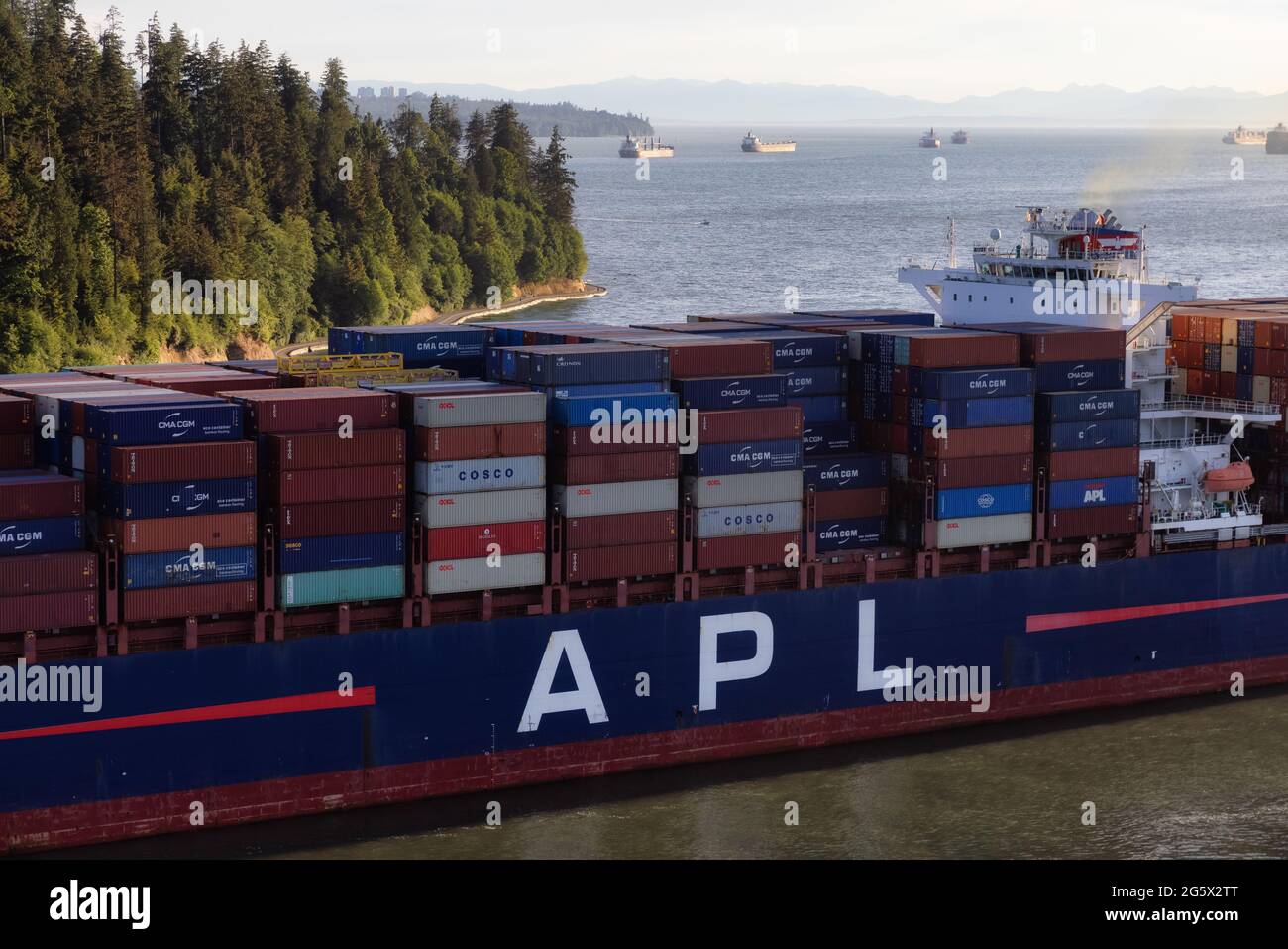 Cargo Ship arriving to the Port on the West Coast Pacific Ocean Stock ...