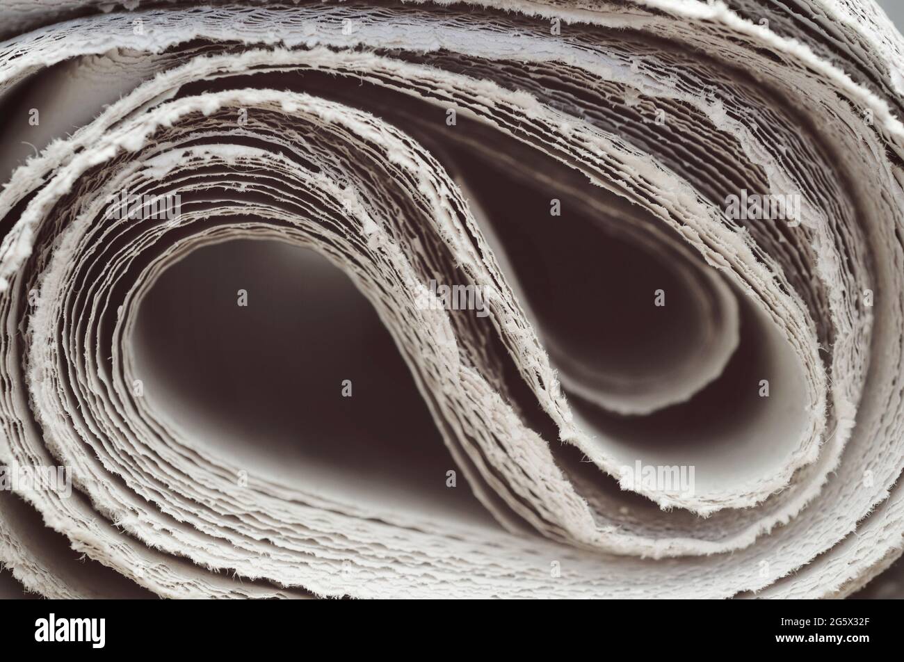 rolled up newspaper Stock Photo - Alamy