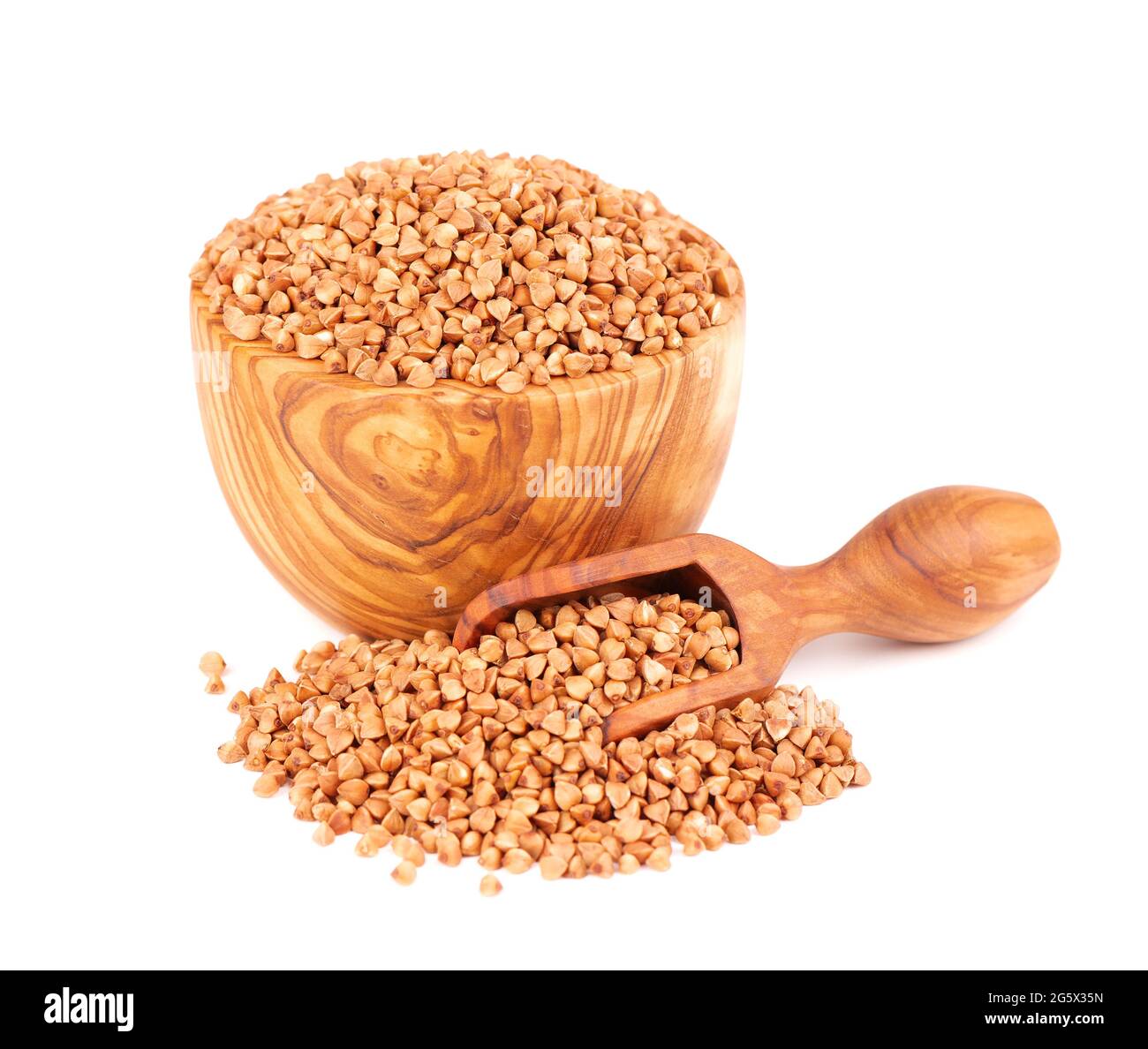 Roasted buckwheat grains in olive bowl and scoop, isolated on white ...