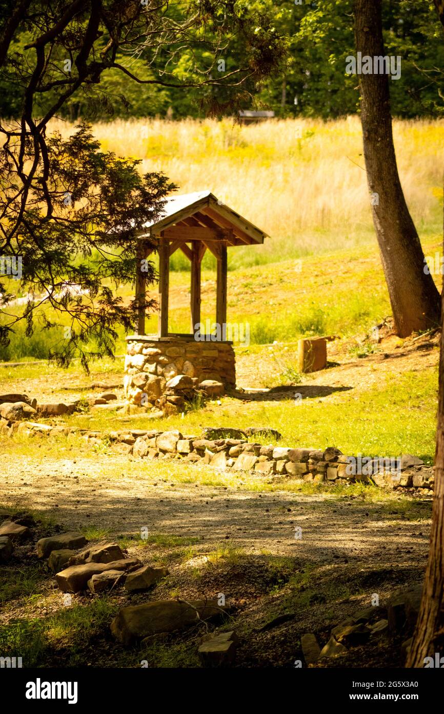 Old wooden well in fall hi-res stock photography and images - Alamy