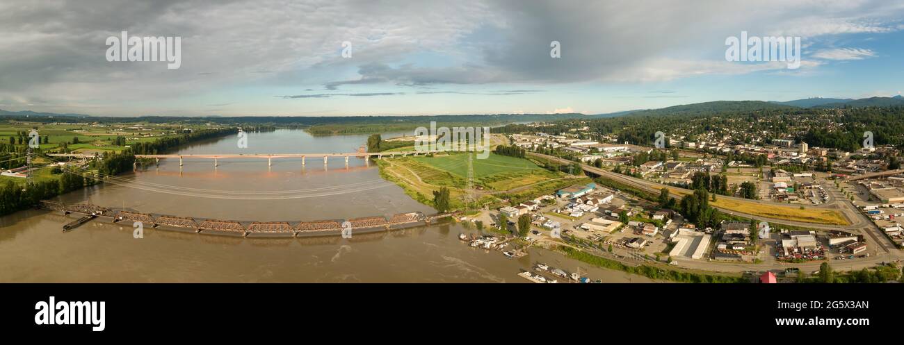 Aerial Panoramic View of Fraser River, Bridge and Mission City Stock ...