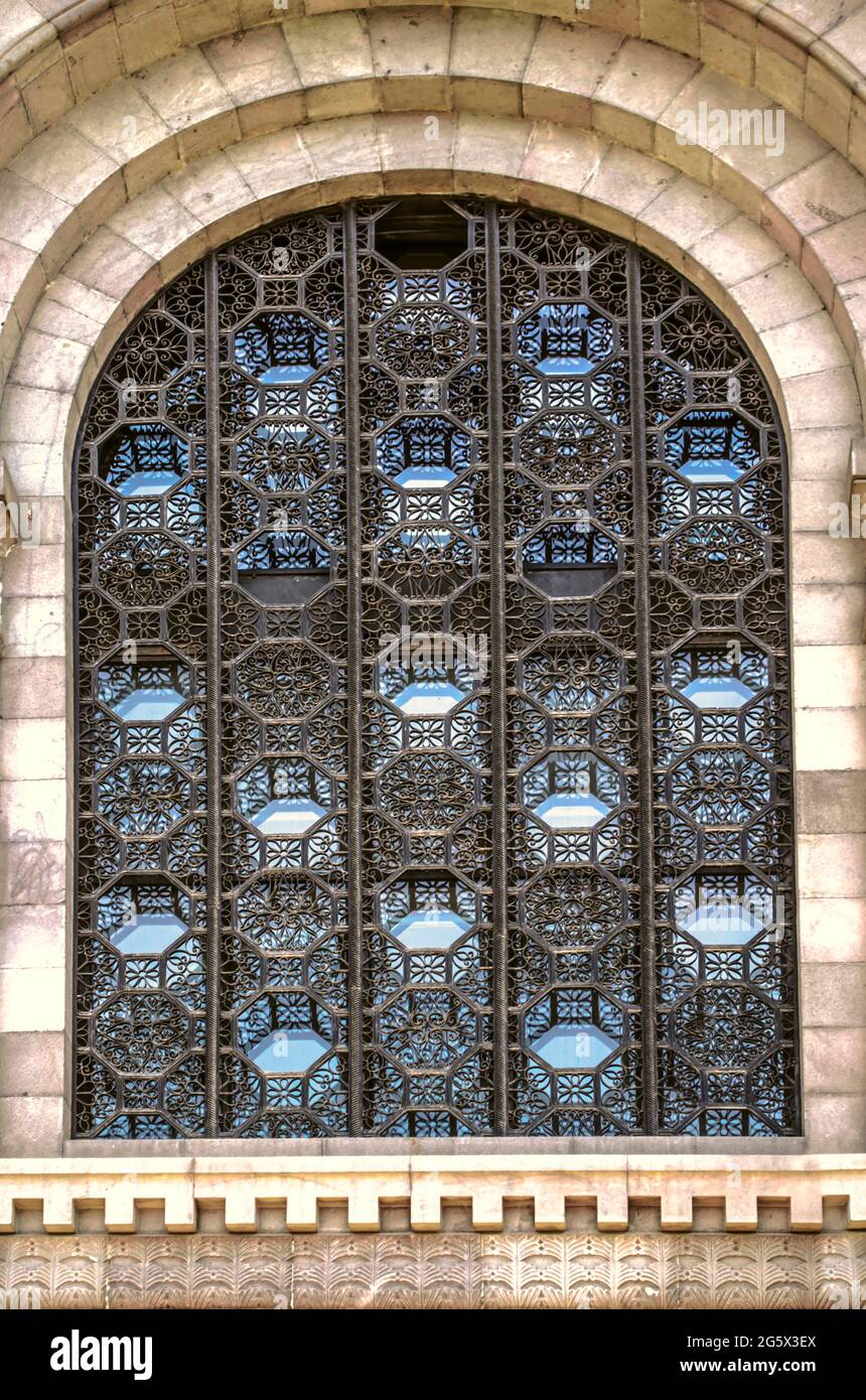 Wrought iron grating on the large front window of the Matenadaran ...
