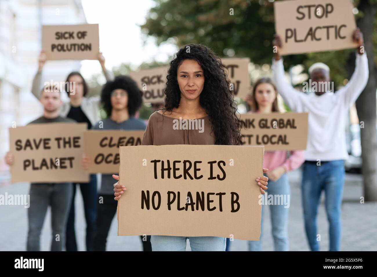 Female leader leading international group of protestors against ...