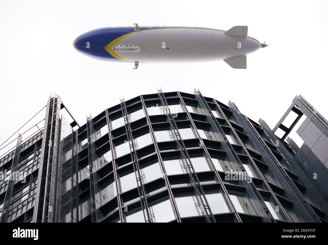The Goodyear Blimp flying over the City of London. Picture date ...