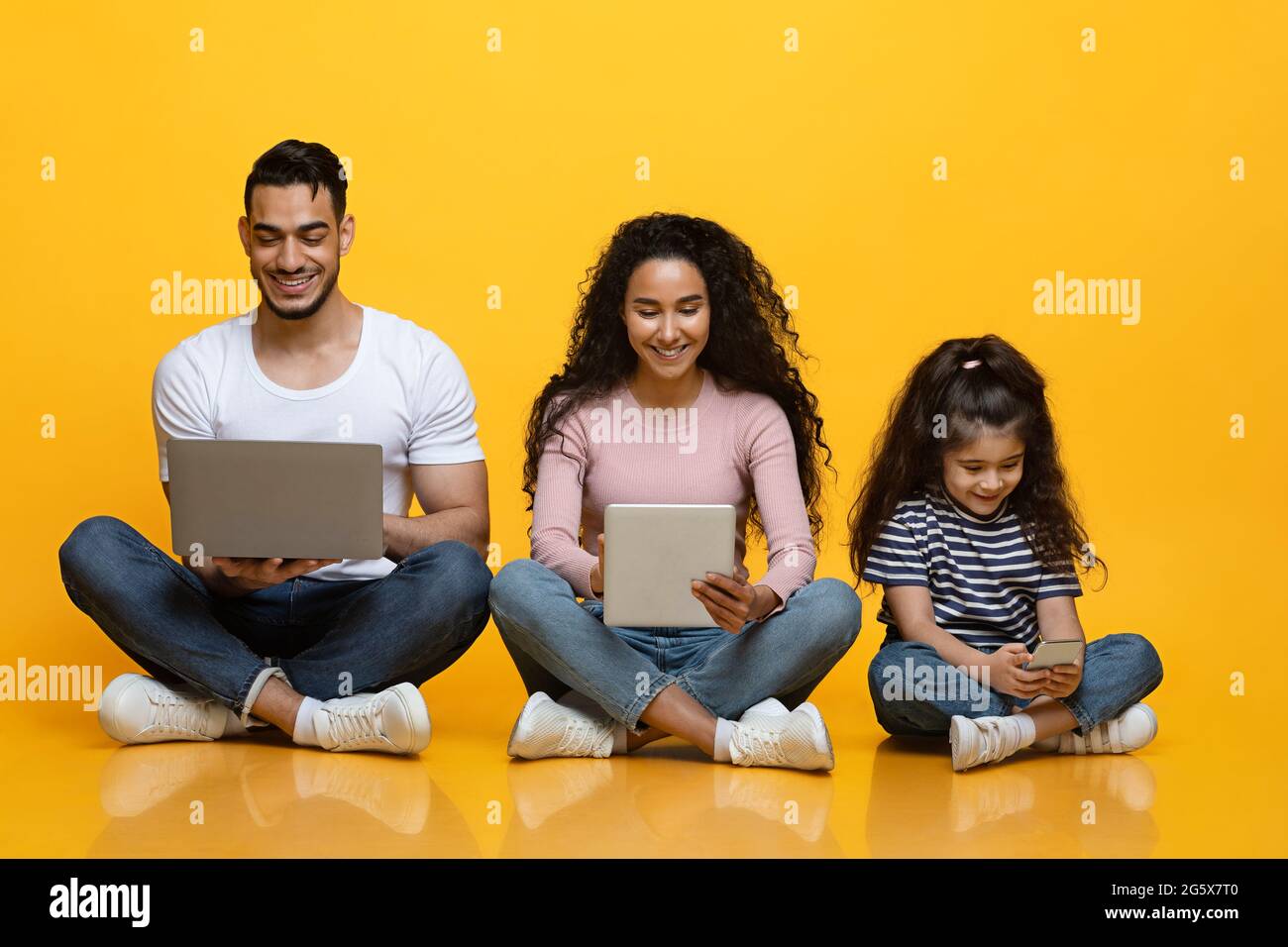 Electronic devices family hi-res stock photography and images - Alamy
