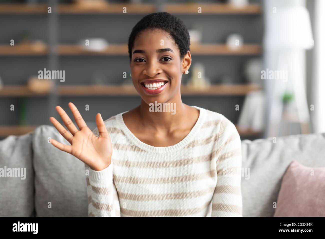 Portrait african american woman waving hi-res stock photography and ...