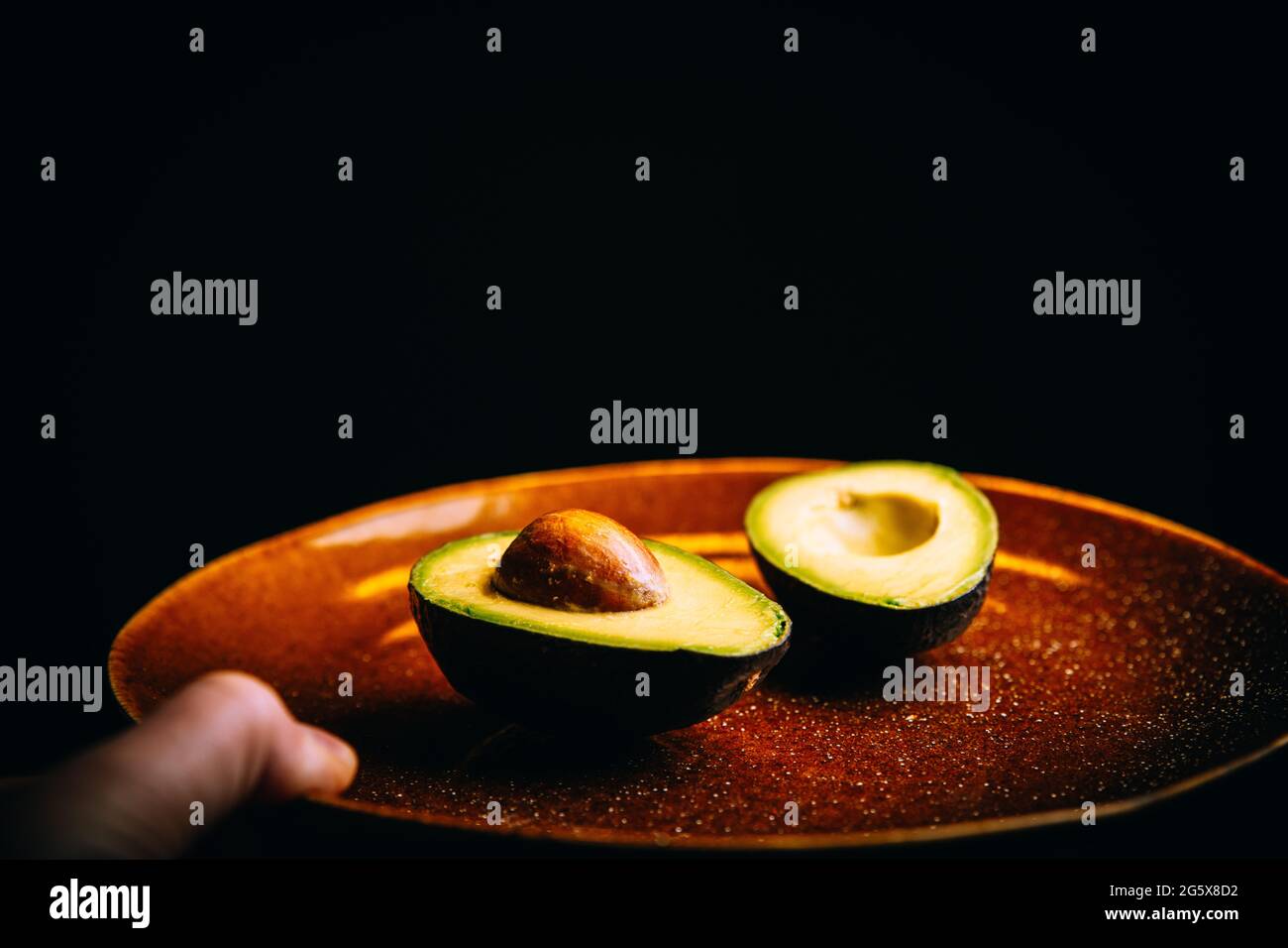Half avocado plate hi-res stock photography and images - Alamy