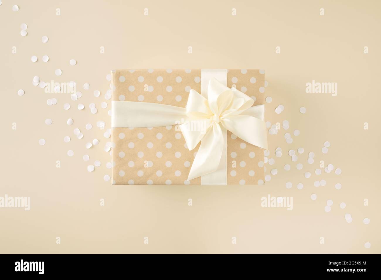 Beige bow hi-res stock photography and images - Alamy