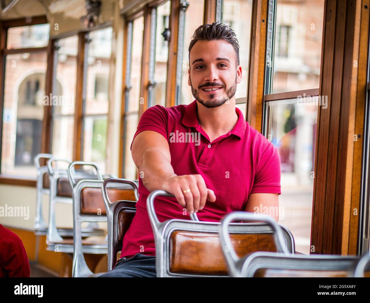 Man standing riding bus hi-res stock photography and images - Alamy