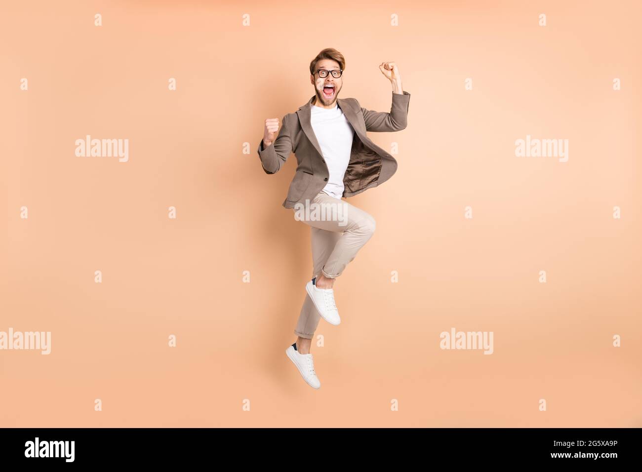 Full body profile side photo of attractive happy crazy man jump up air ...